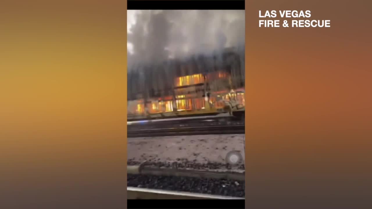 WATCH: Train car sparks fire near parking garage in downtown Las Vegas