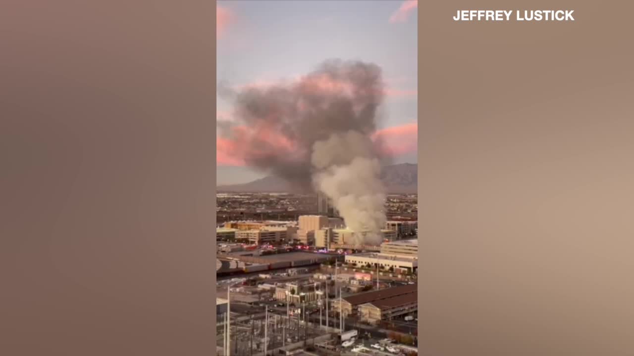 WATCH: Train car sparks fire near parking garage in downtown Las Vegas