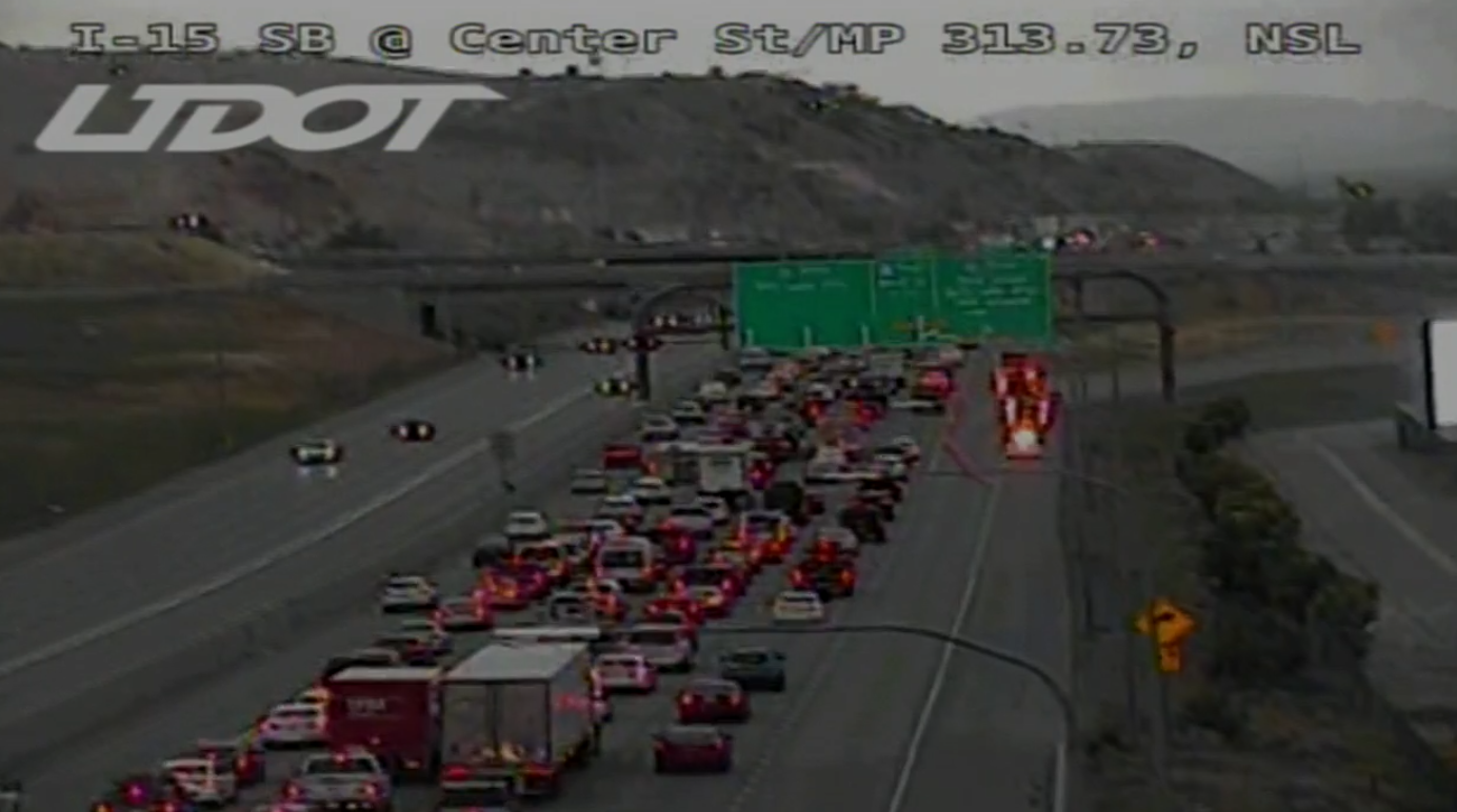 Crash downed power lines causing commuter delays on I-215