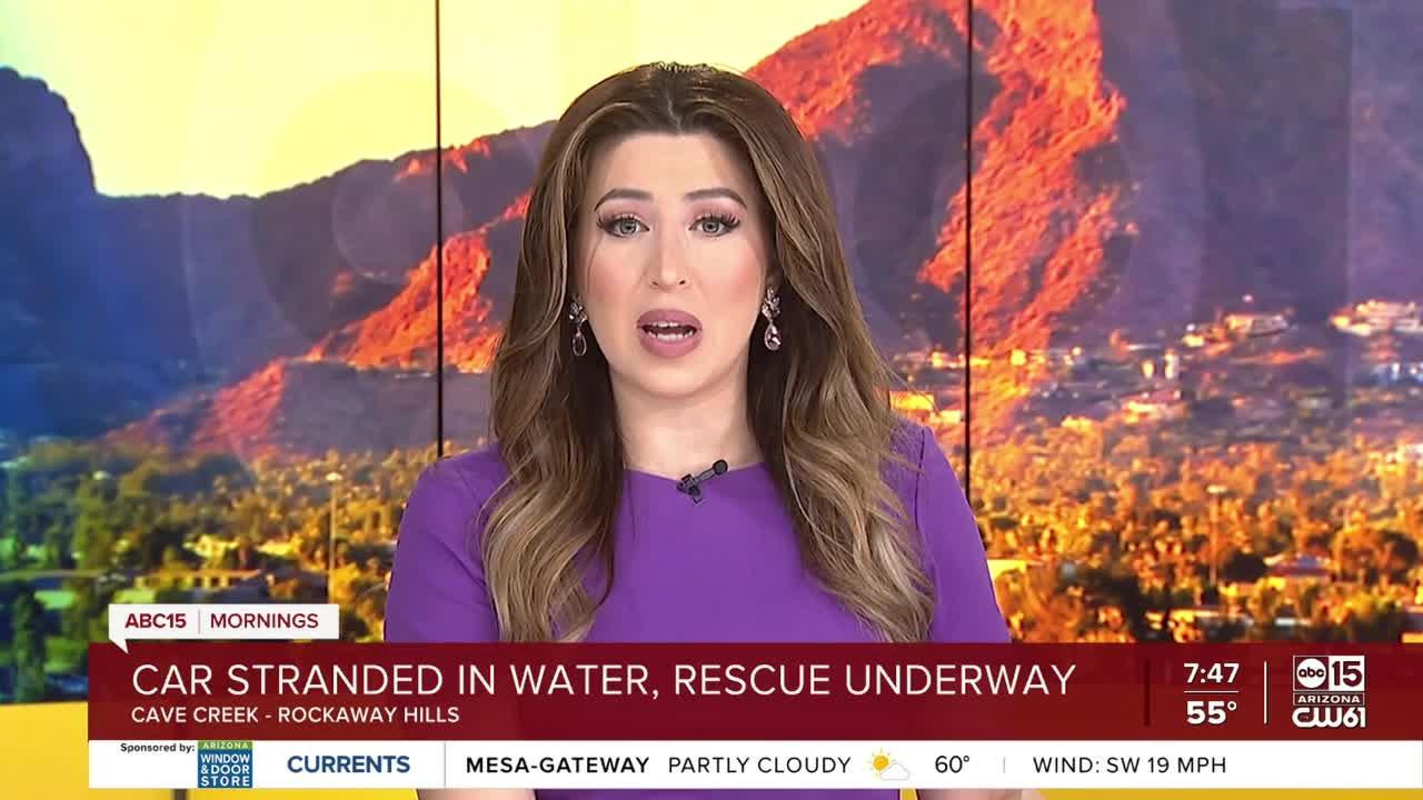 VIDEO: Crews rescue two people amid flooding in Cave Creek area