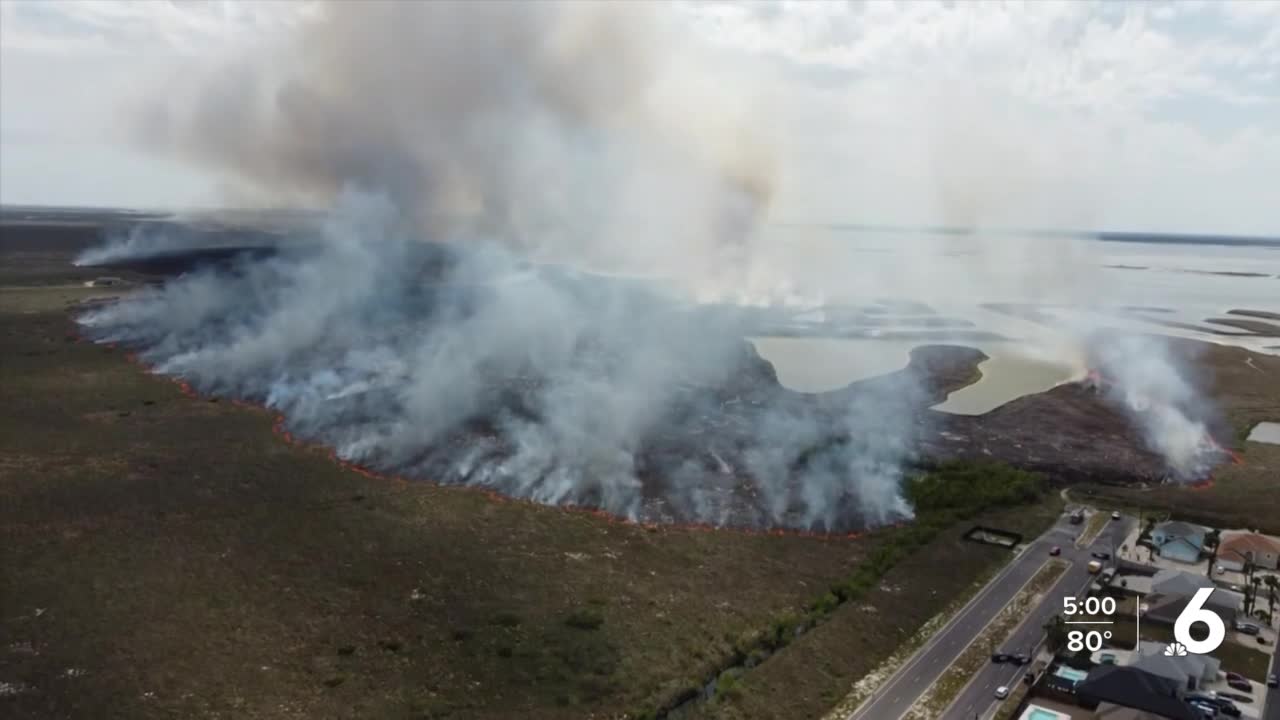 Fire crews back on island after fire reignited