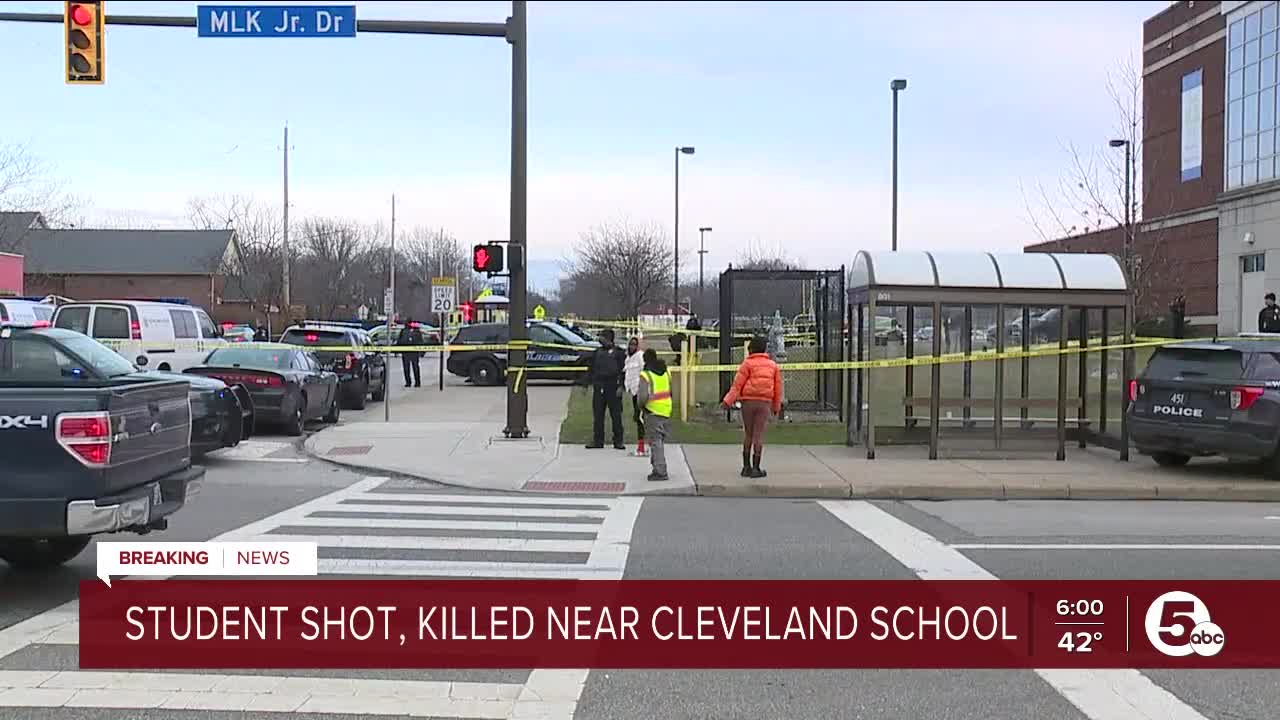 Student shot and killed at bus stop near John Adams high school