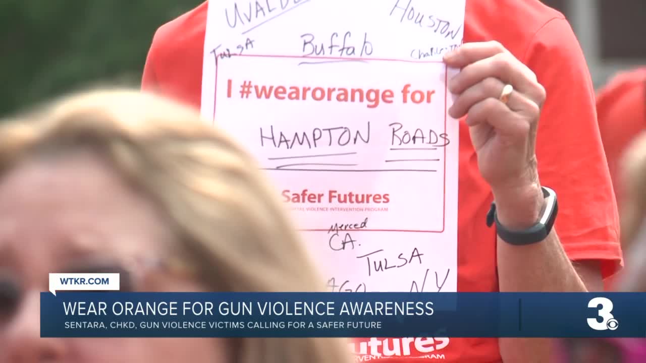 Gathering in unity, wearing orange to raise awareness of gun violence
