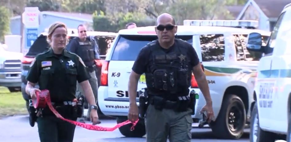 Suspect arrested after PBSO deputy pinned between cars