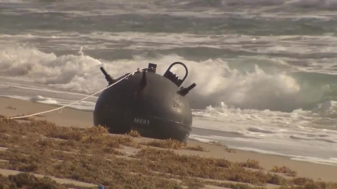 Sea mine used for military training washes up on beach