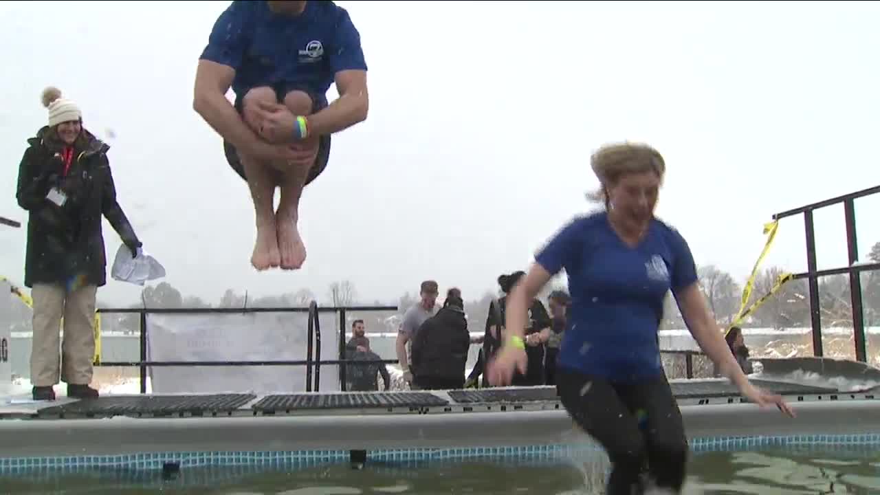 Dozens brave the cold for a good cause in annual Polar Plunge