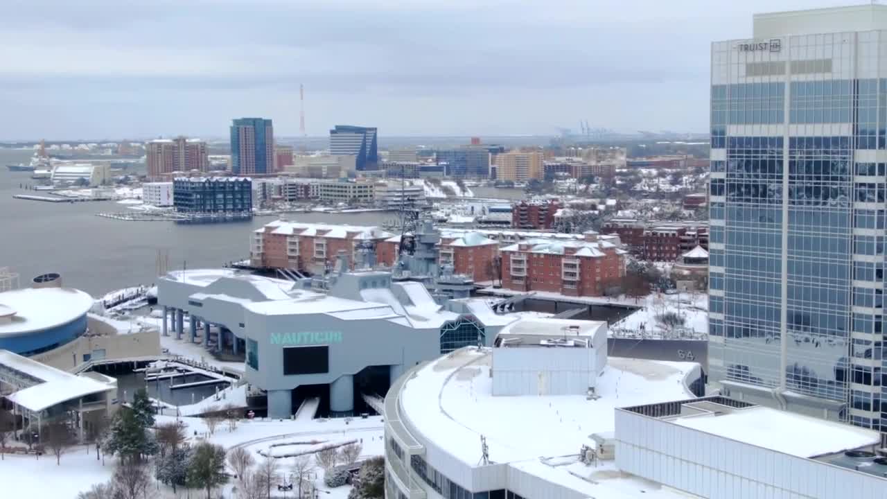 People brave the cold in Virginia Beach to enjoy first big snow in years