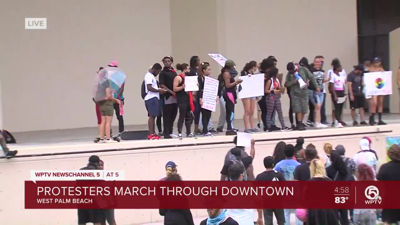 Protesters march through downtown West Palm Beach