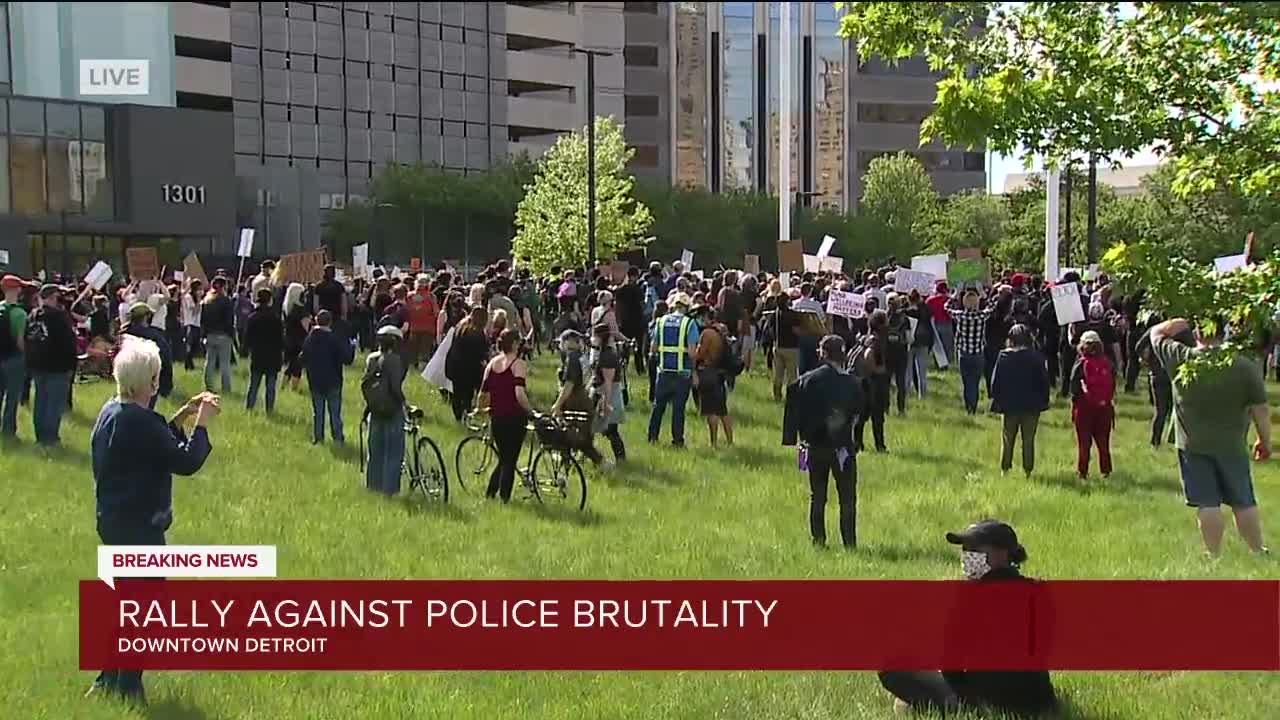 9 in custody as hundreds gather at rally in downtown Detroit