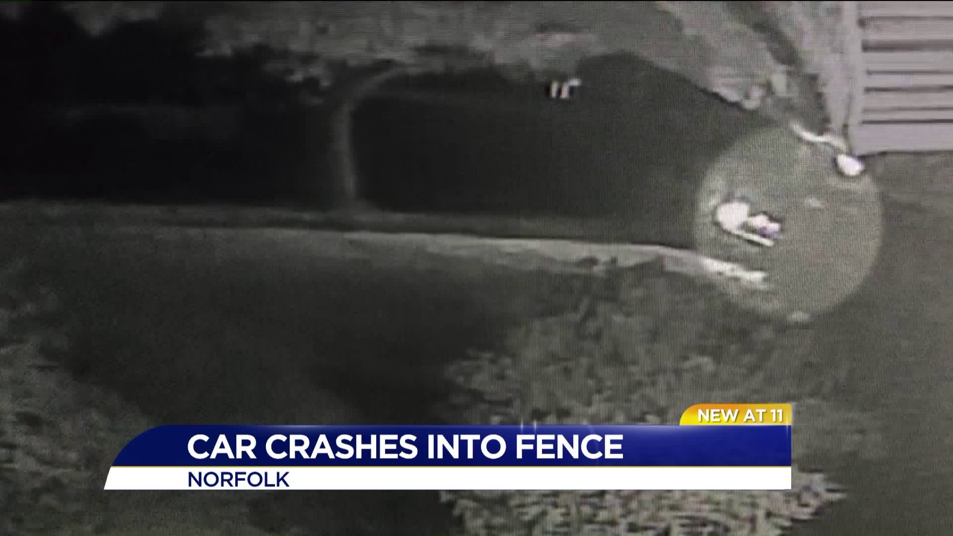 Car crashes into fence, just feet away from Norfolk home
