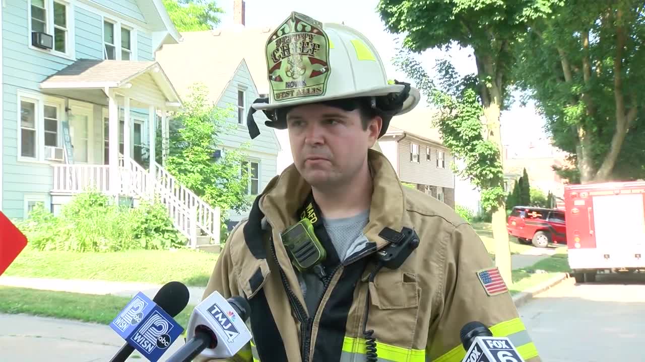 Firefighters rescue 2 people from third-floor balcony during West Allis ...