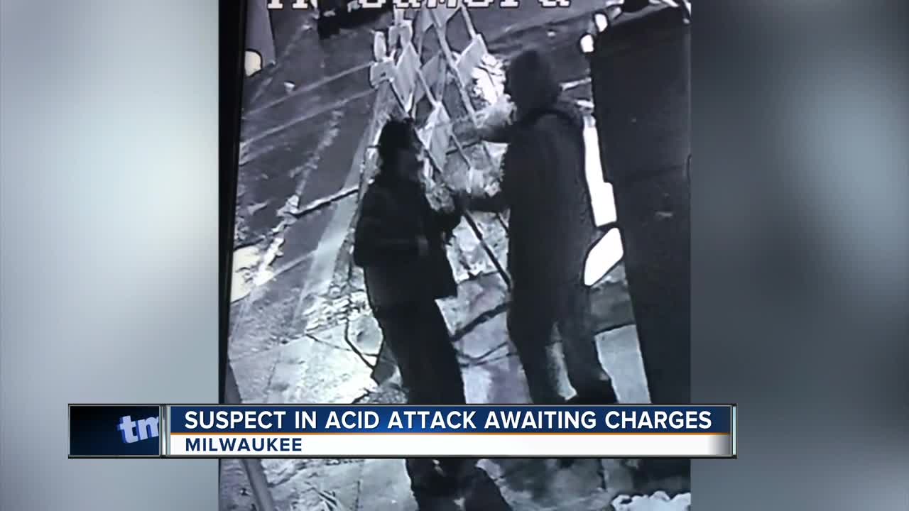 Suspect arrested in acid attack awaiting charges