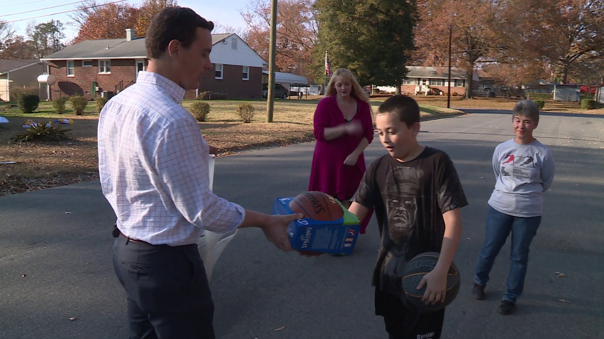 Jake Burns surprises young athlete with sports gear